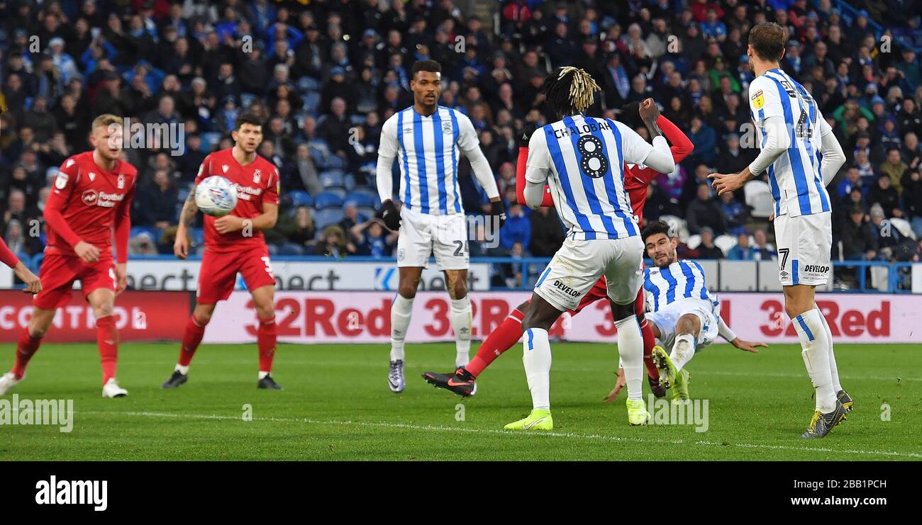 Huddersfield Town's Christopher Schindler scores his sides opening goal ...
