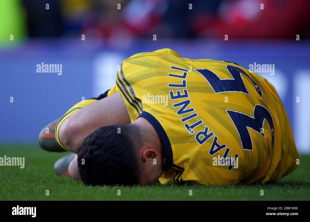 Arsenal's Gabriel Martinelli lies on the pitch injured Stock Photo - Alamy