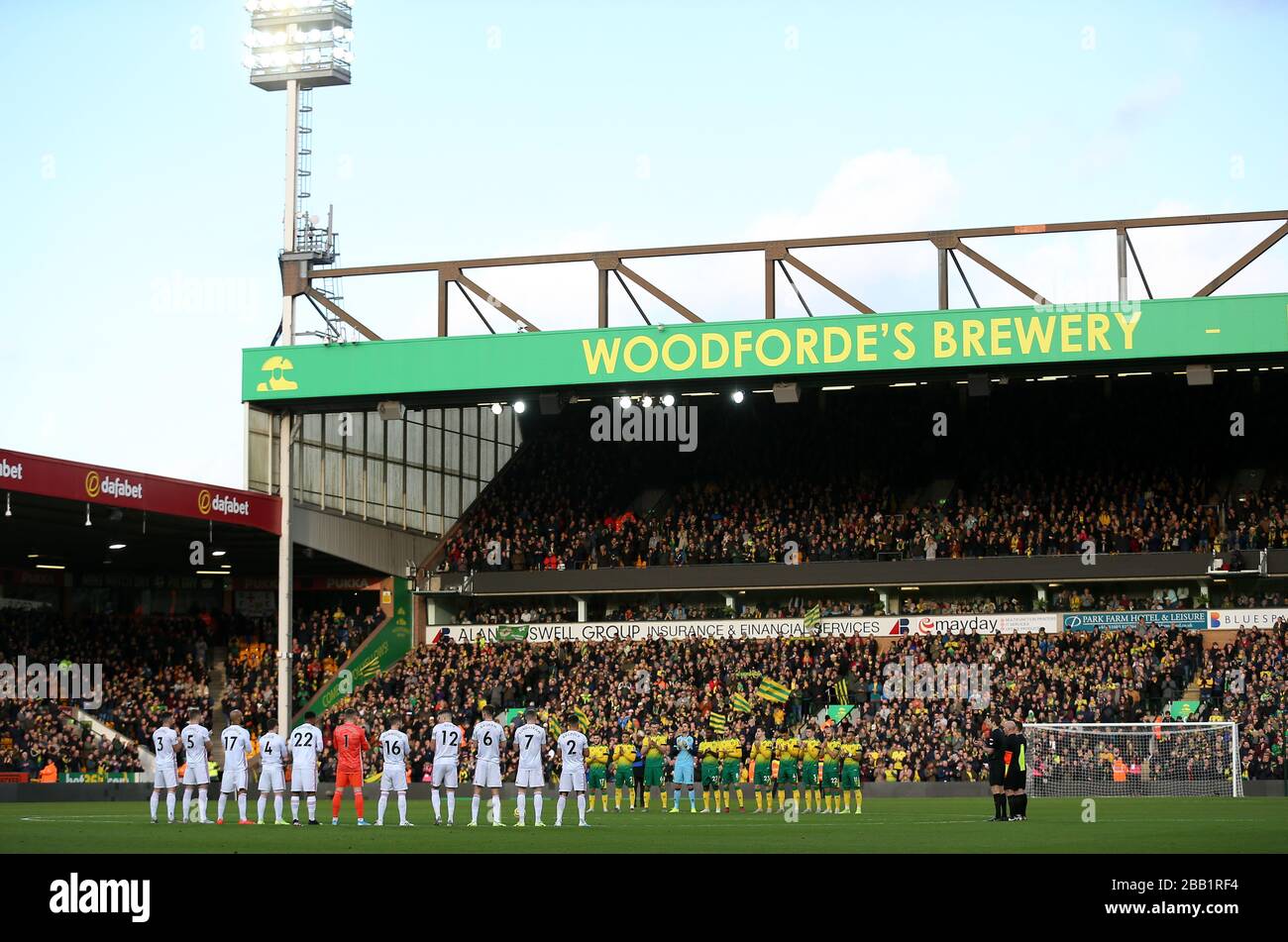 Players observe a minute's silence in memory of the late Ron Saunders ...