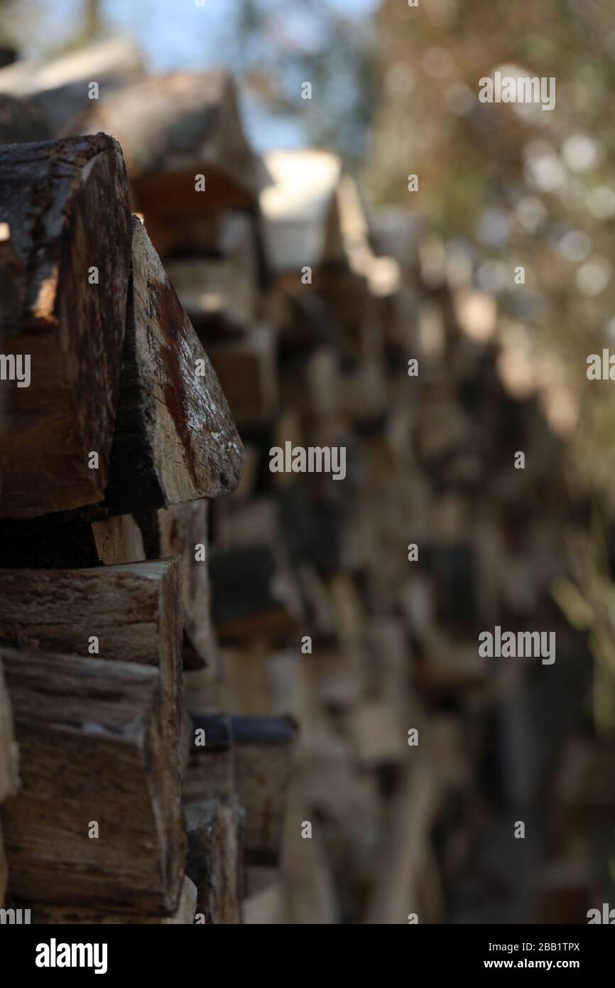Firewood stock split and piled up Stock Photo - Alamy