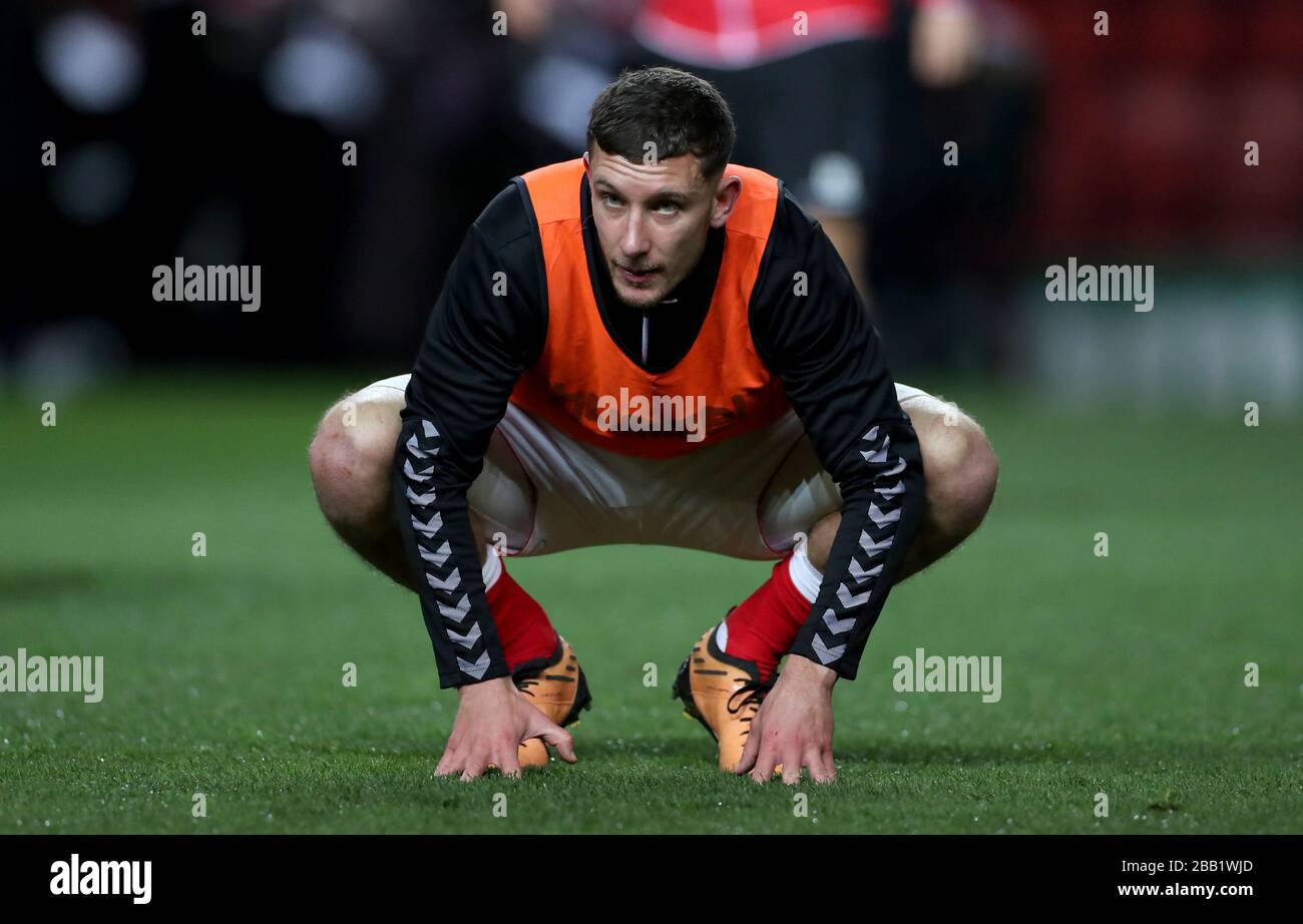 Charlton Athletic's Jason Pearce warms up ahead of the match Stock ...