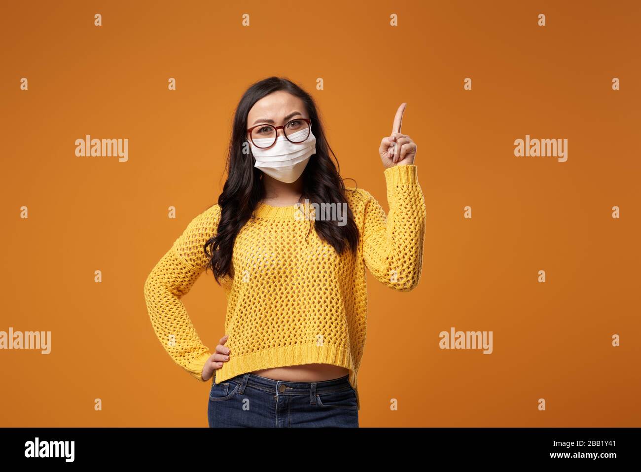 Girl points up in air hi-res stock photography and images - Alamy