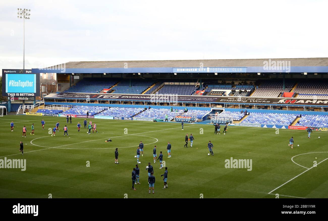 Coventry City players warm-up on the pitch ahead of the match Stock ...