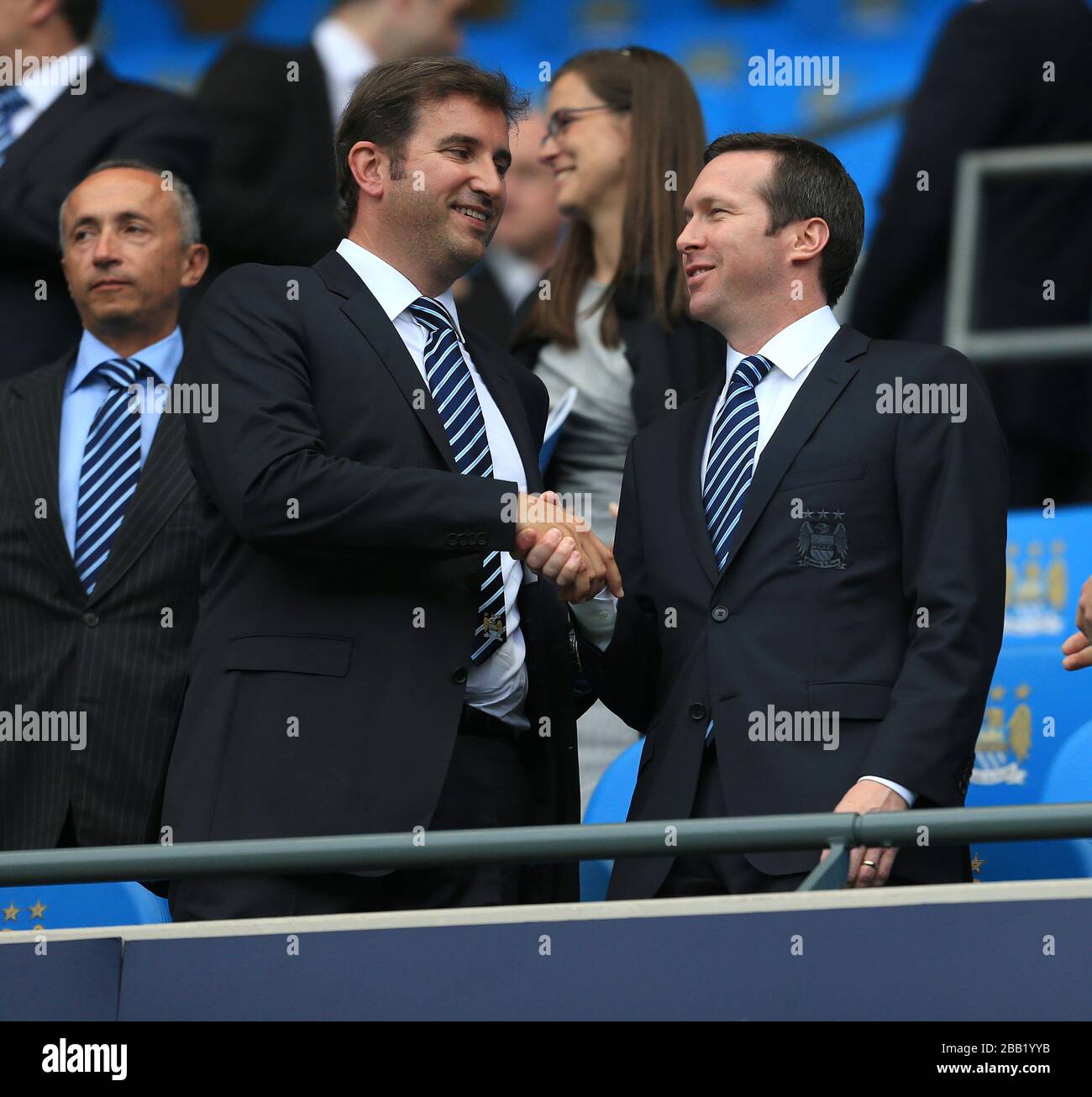 Manchester City's chief executive officer Ferran Soriano (left) chats ...