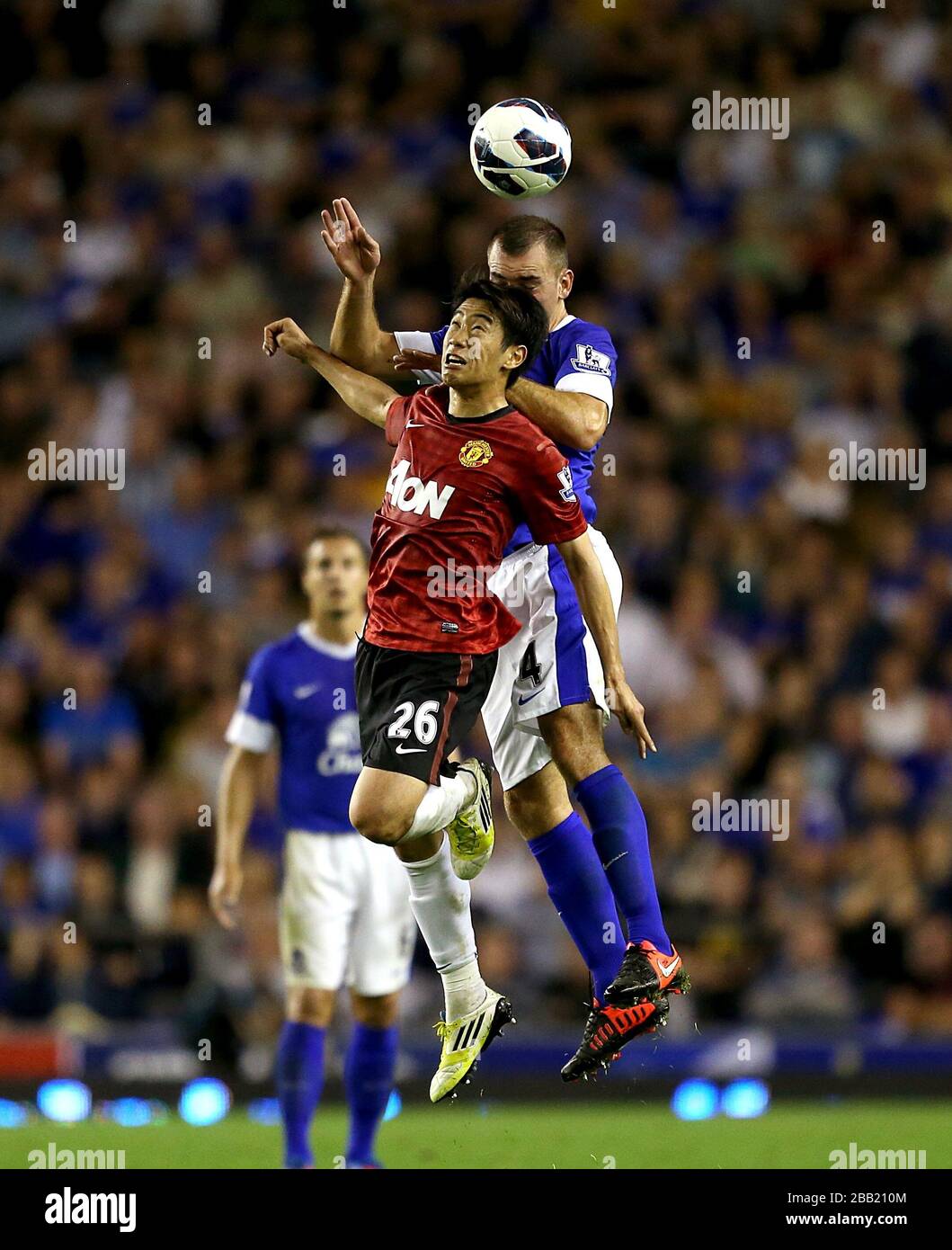 Manchester United's Shinji Kagawa (left) in action with Everton's ...