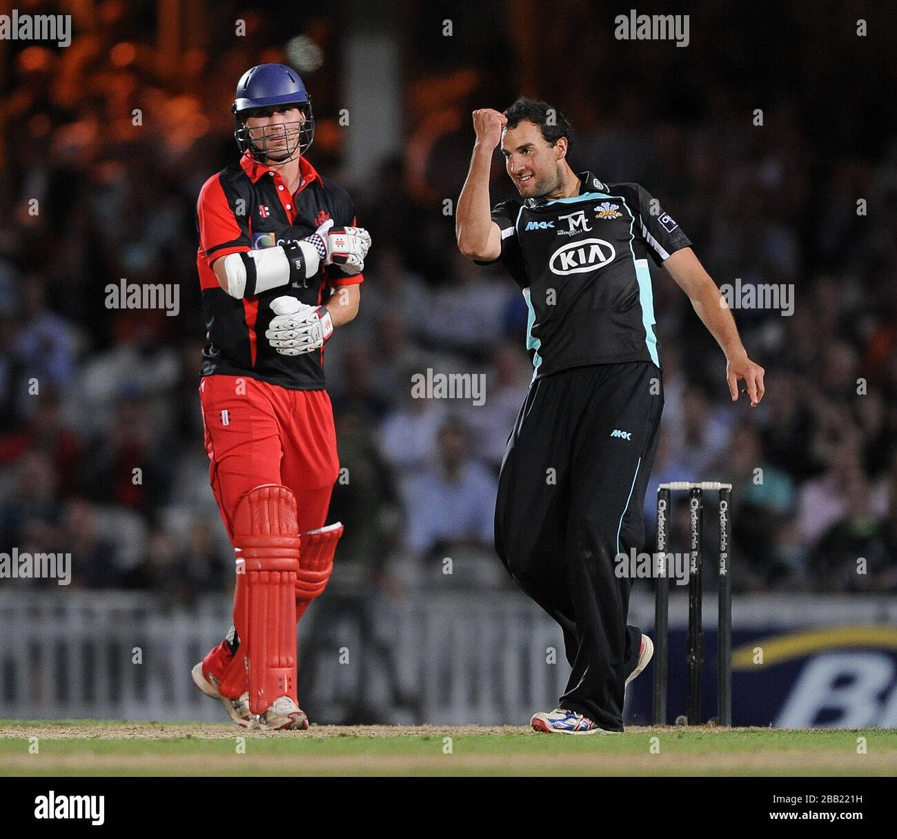 Surrey's Matthew Spriegel celebrates after taking Glamorgan's final ...