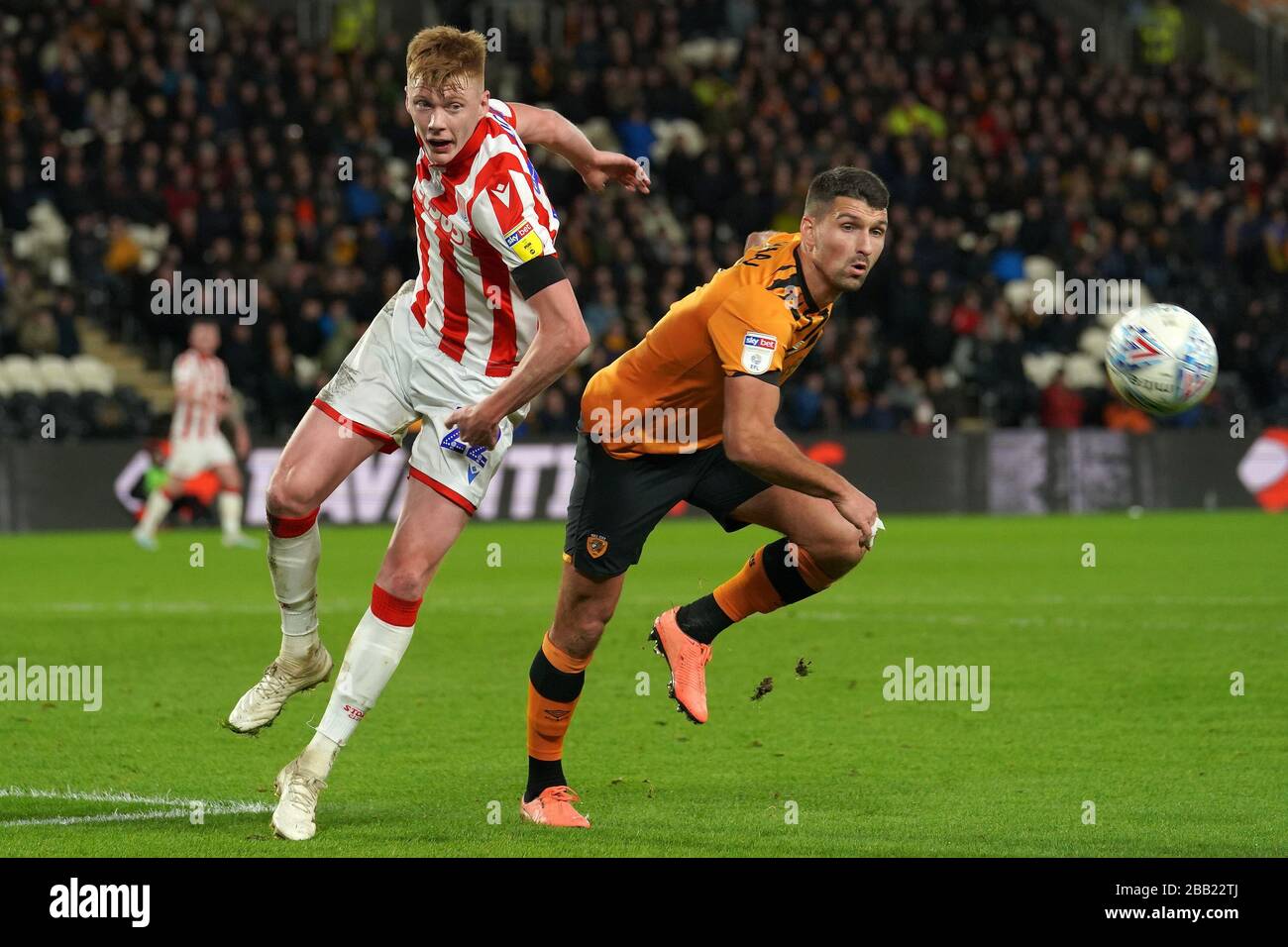 Hull City's Eric Lichaj and Stoke City's Sam Clucas battle for the ball ...