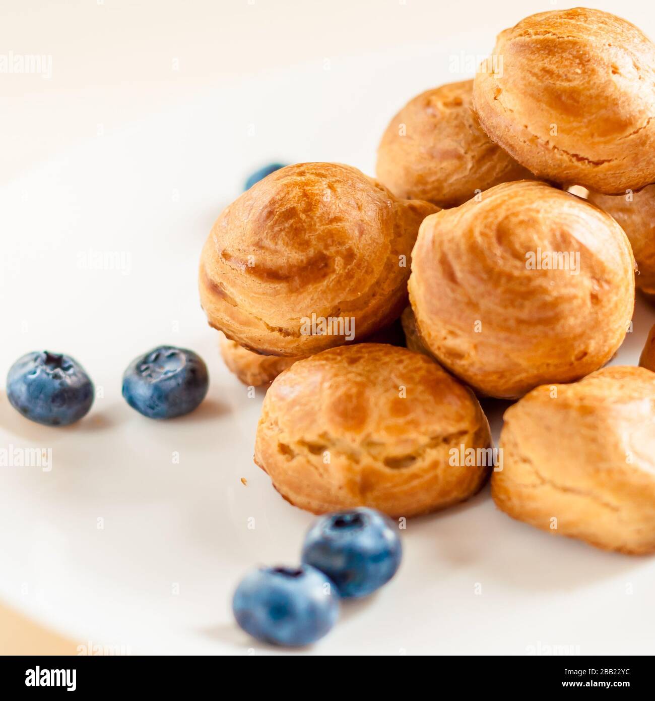 Eating profiteroles hi-res stock photography and images - Alamy