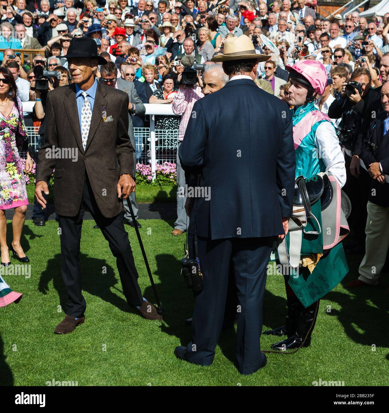 Trainer Sir Henry Cecil (left) and jockey Tom Queally (r) in the ...