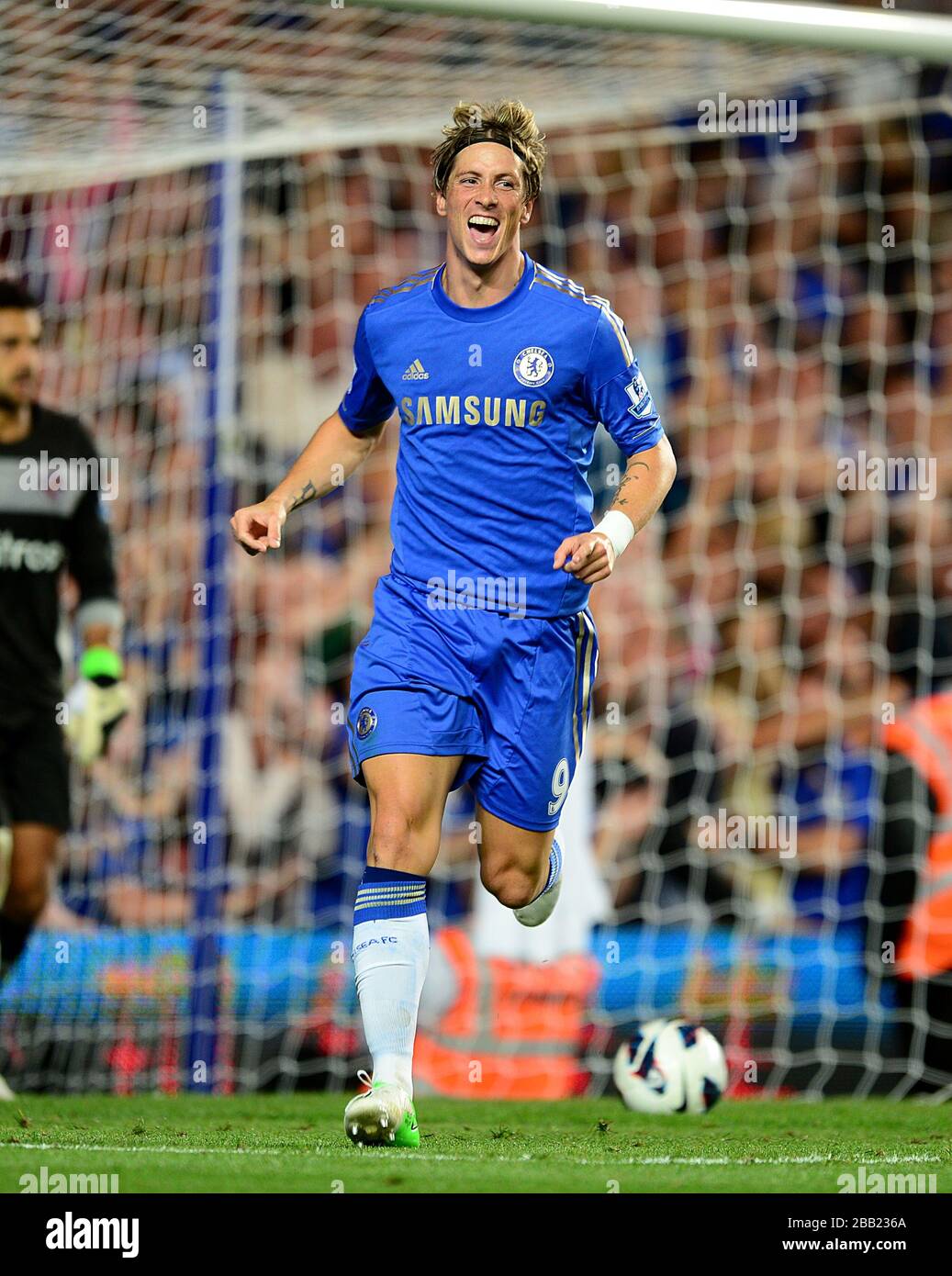 Chelsea's Fernando Torres celebrates scoring his side's third goal of ...