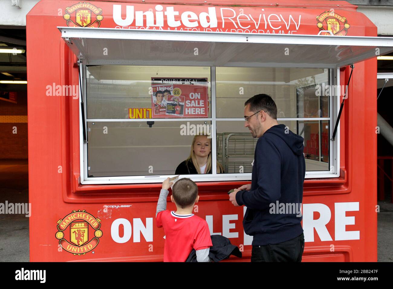 United review programme sellers at work outside Old Trafford before the ...