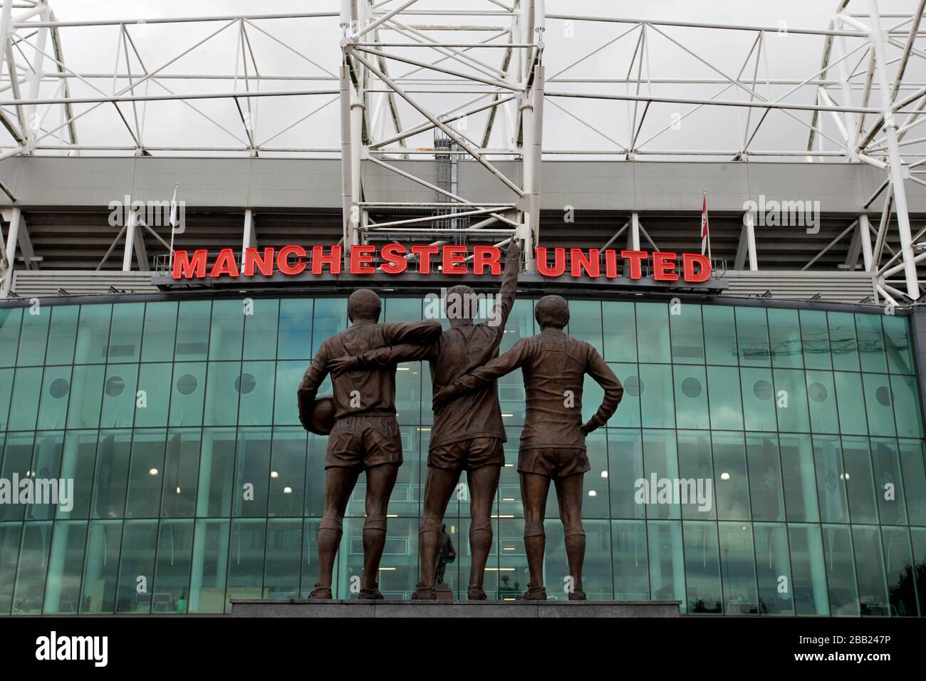 A General view of Old Trafford, The United Trinity statue of former ...