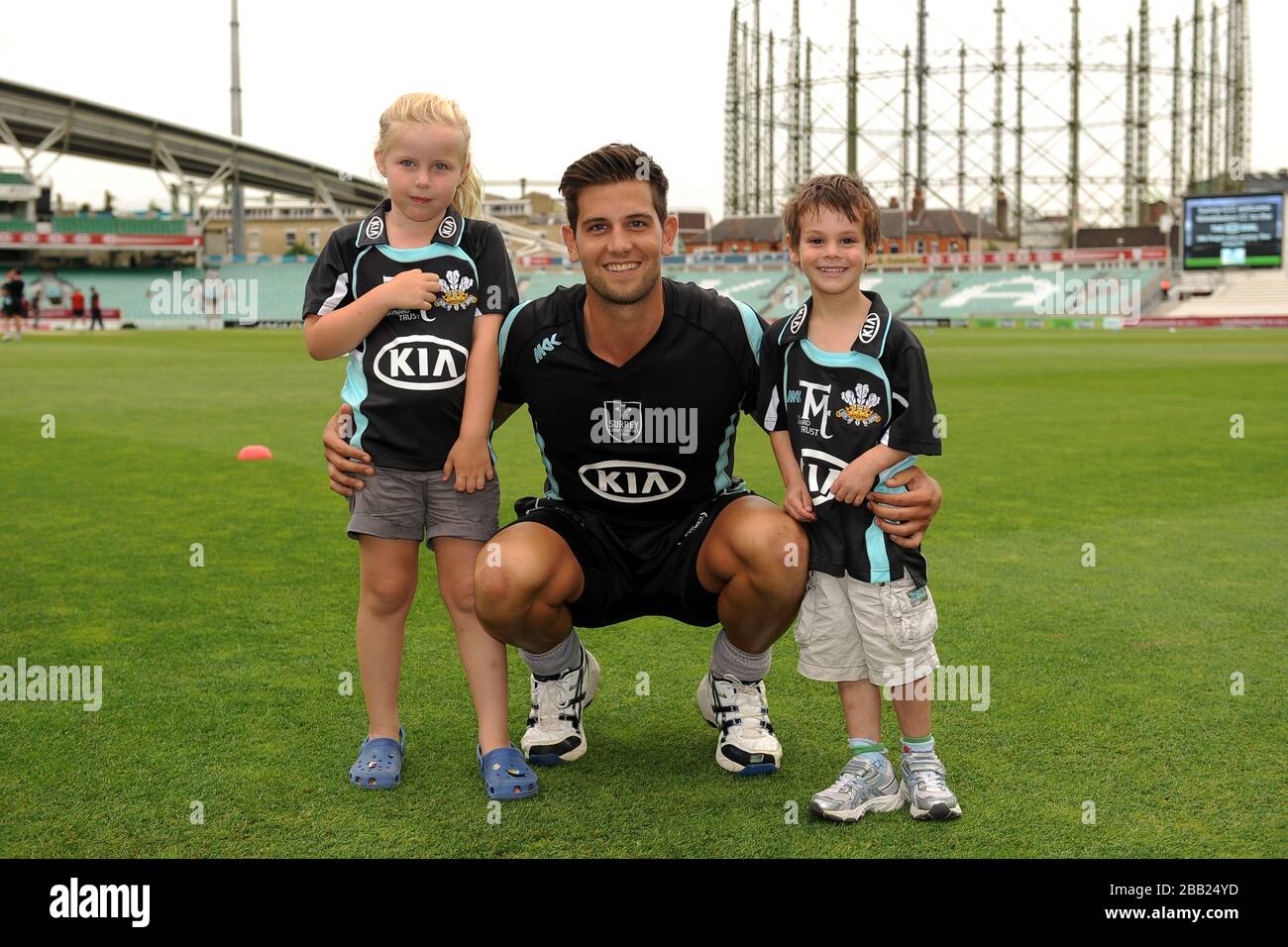 Surrey's Jade Dernbach with mascots Tyler De Bruyn and Molly Adams ...