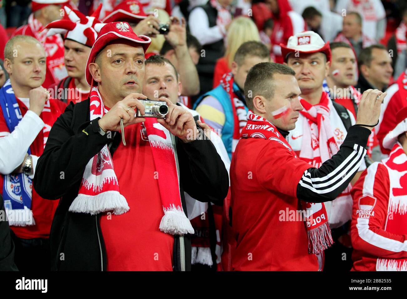 Poland fans in the stands Stock Photo - Alamy