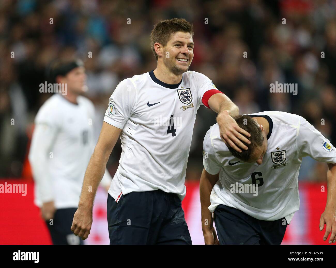 England's Steven Gerrard (left) with Phil Jagielka Stock Photo - Alamy