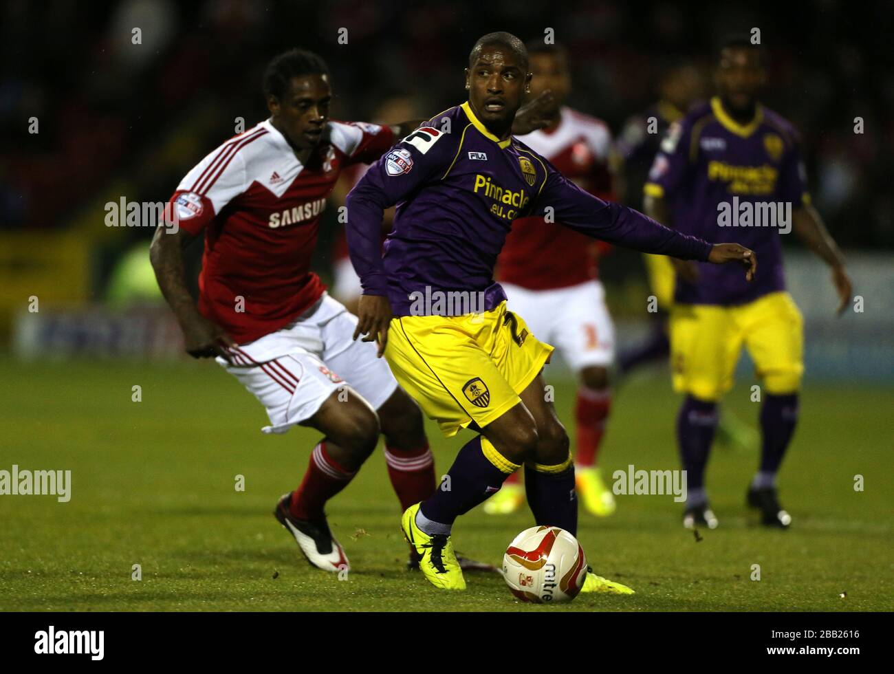 Notts County's Andre Boucaud makes his pass before a challenge from ...