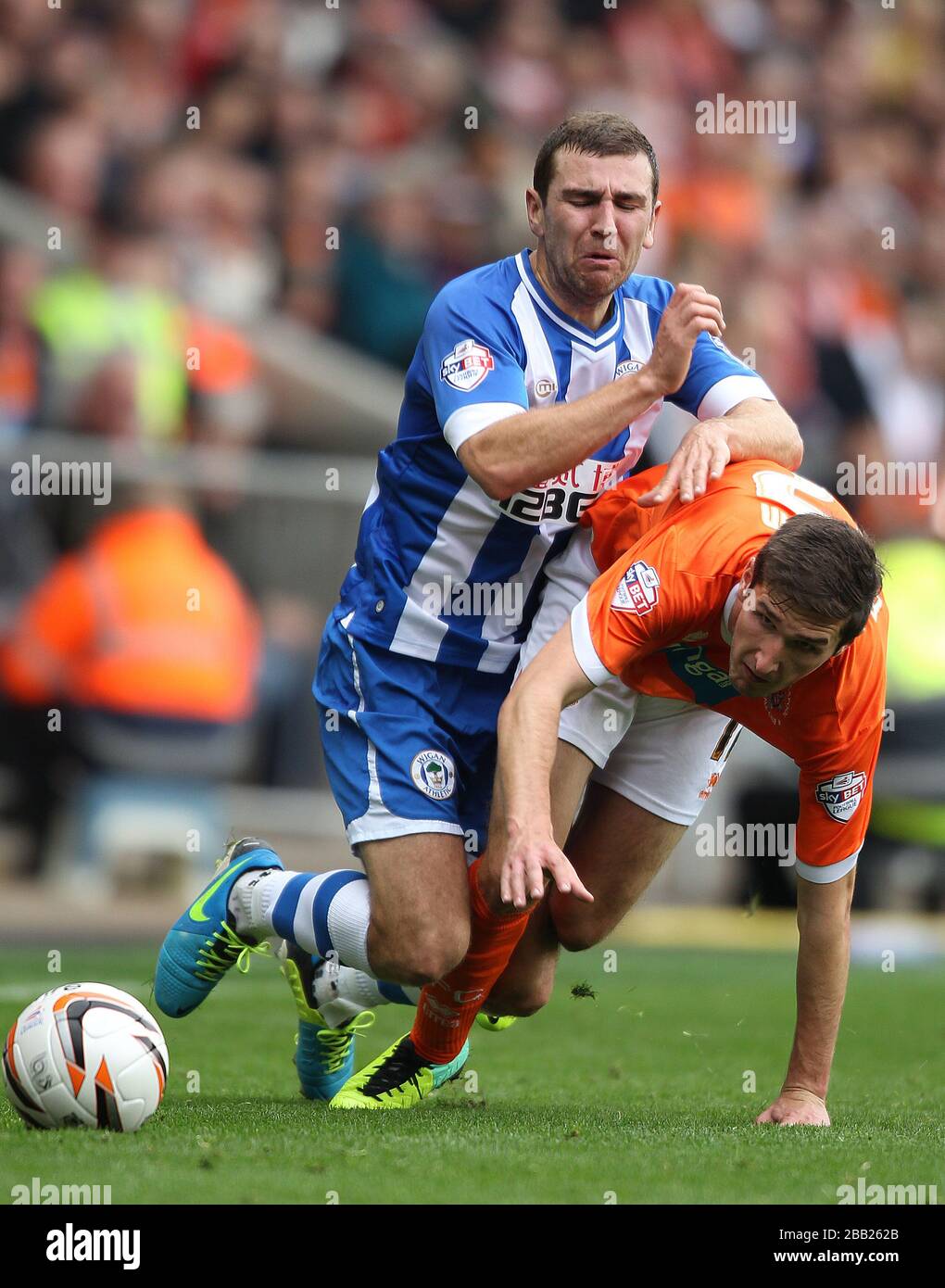 Blackpool's Chris Basham (right) and Wigan Athletic's James McArthur ...