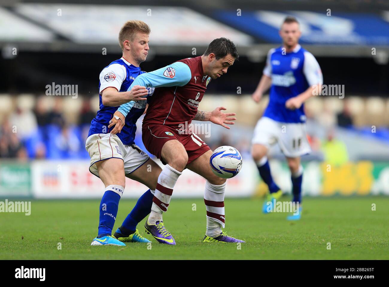 Ipswich Town's Luke Hyam and Burnley's Danny Ings compete for the ball ...