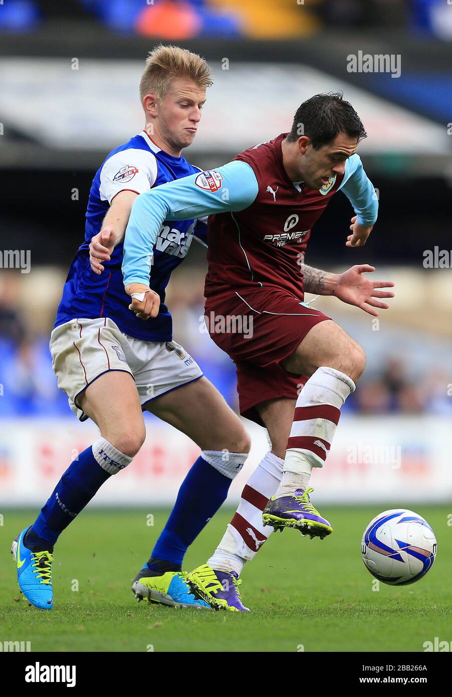 Ipswich Town's Luke Hyam and Burnley's Danny Ings compete for the ball ...