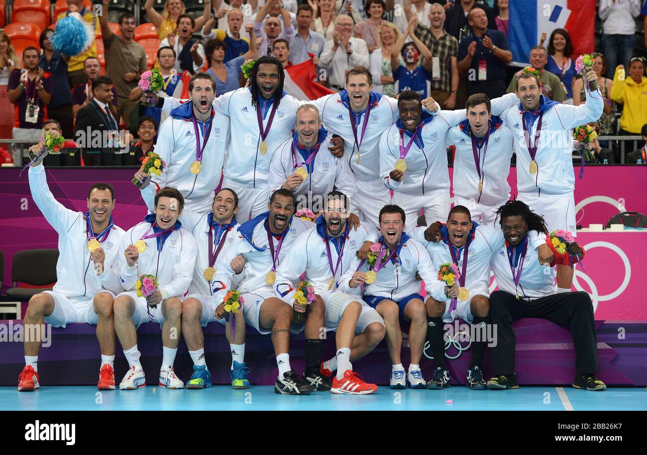 France's Handball team celebrate with their Gold medals after beating ...