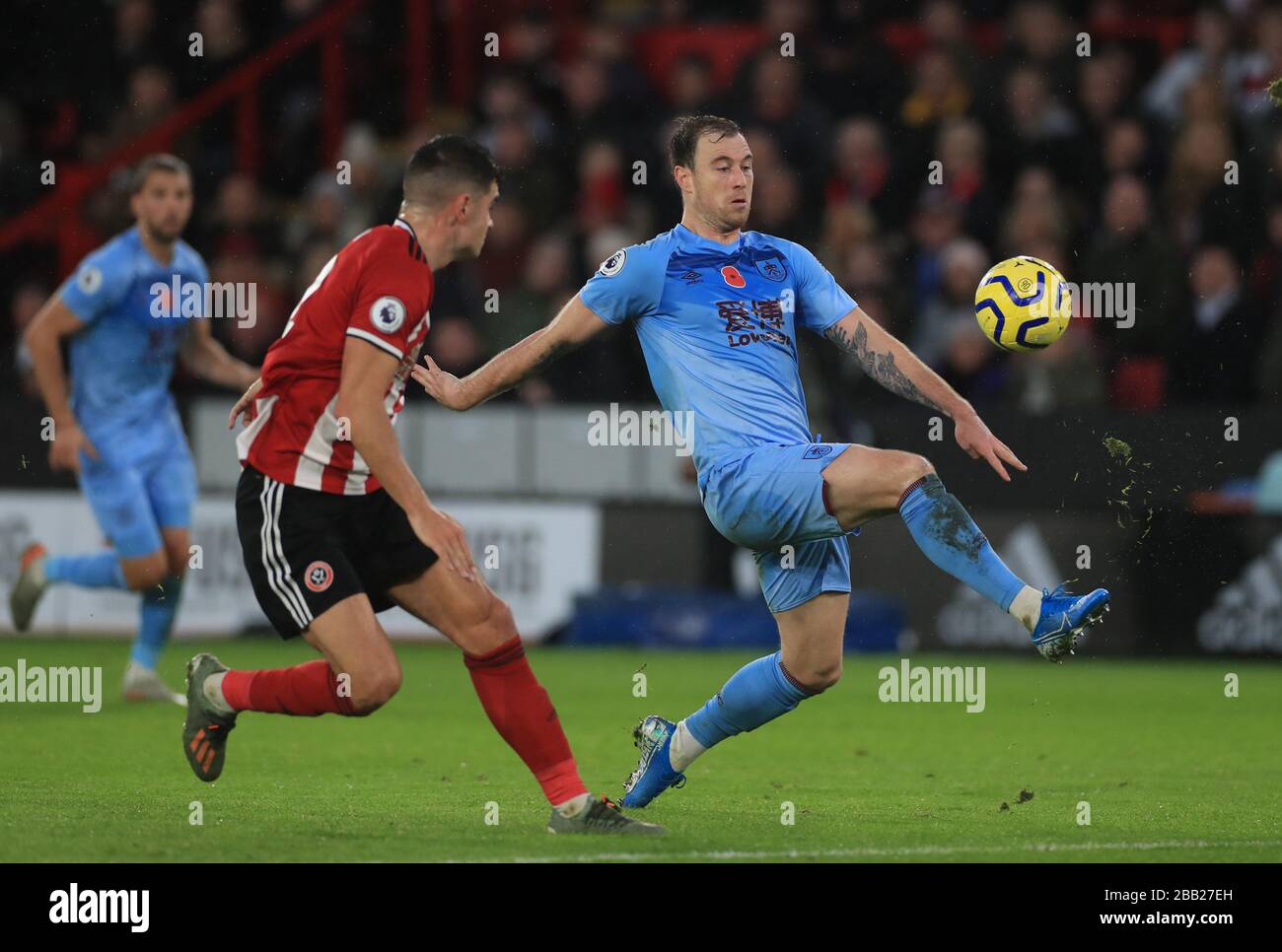 Sheffield United's George Baldock and Burnley's Ashley Barnes battle ...
