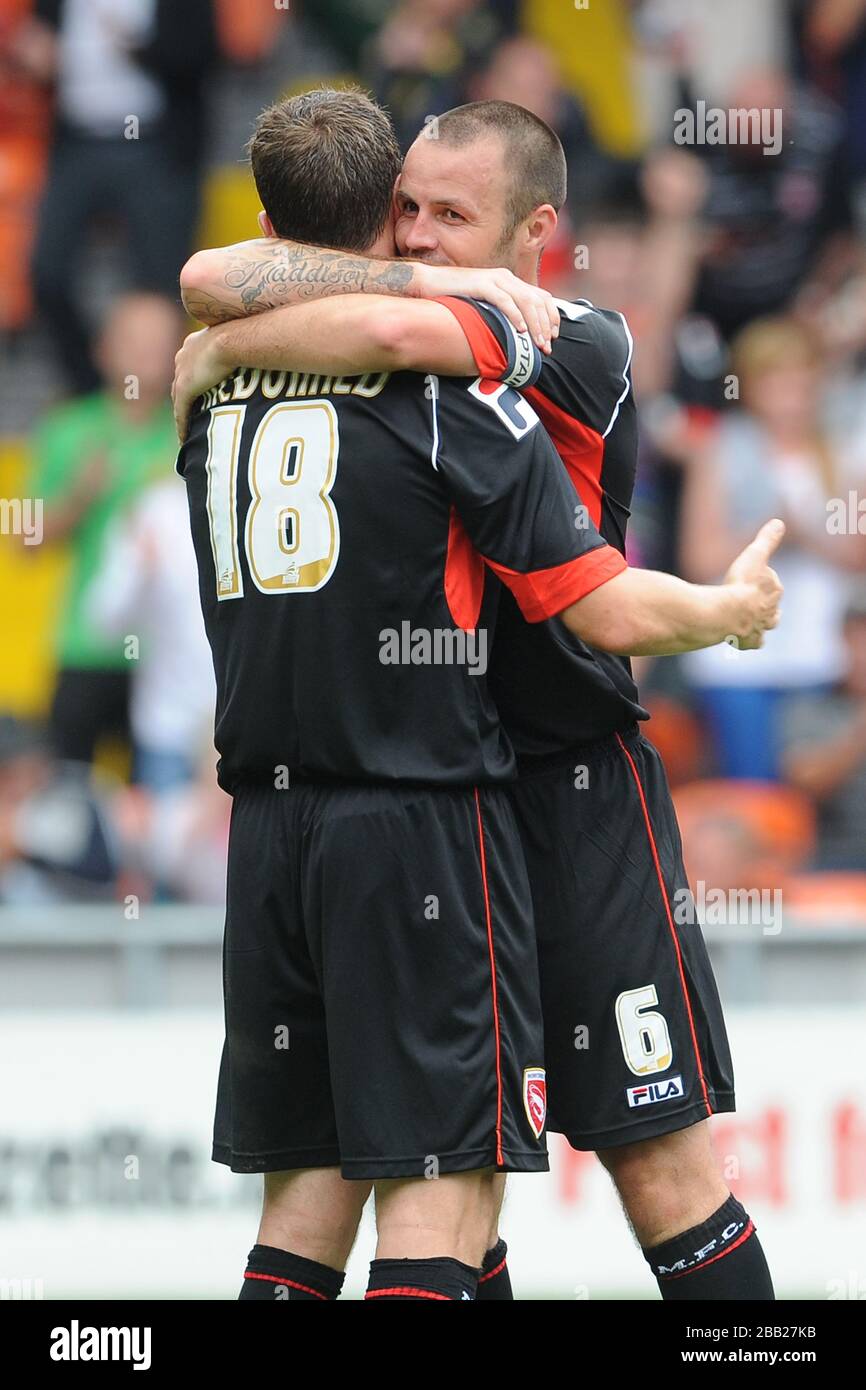 Morecambe's Will Haining and Gary McDonald celebrate victory Stock ...
