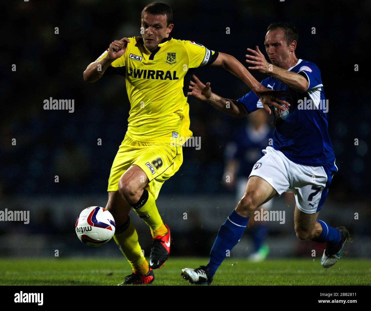Tranmere Rover's James Wallace holds off Chesterfield's Mark Allott ...