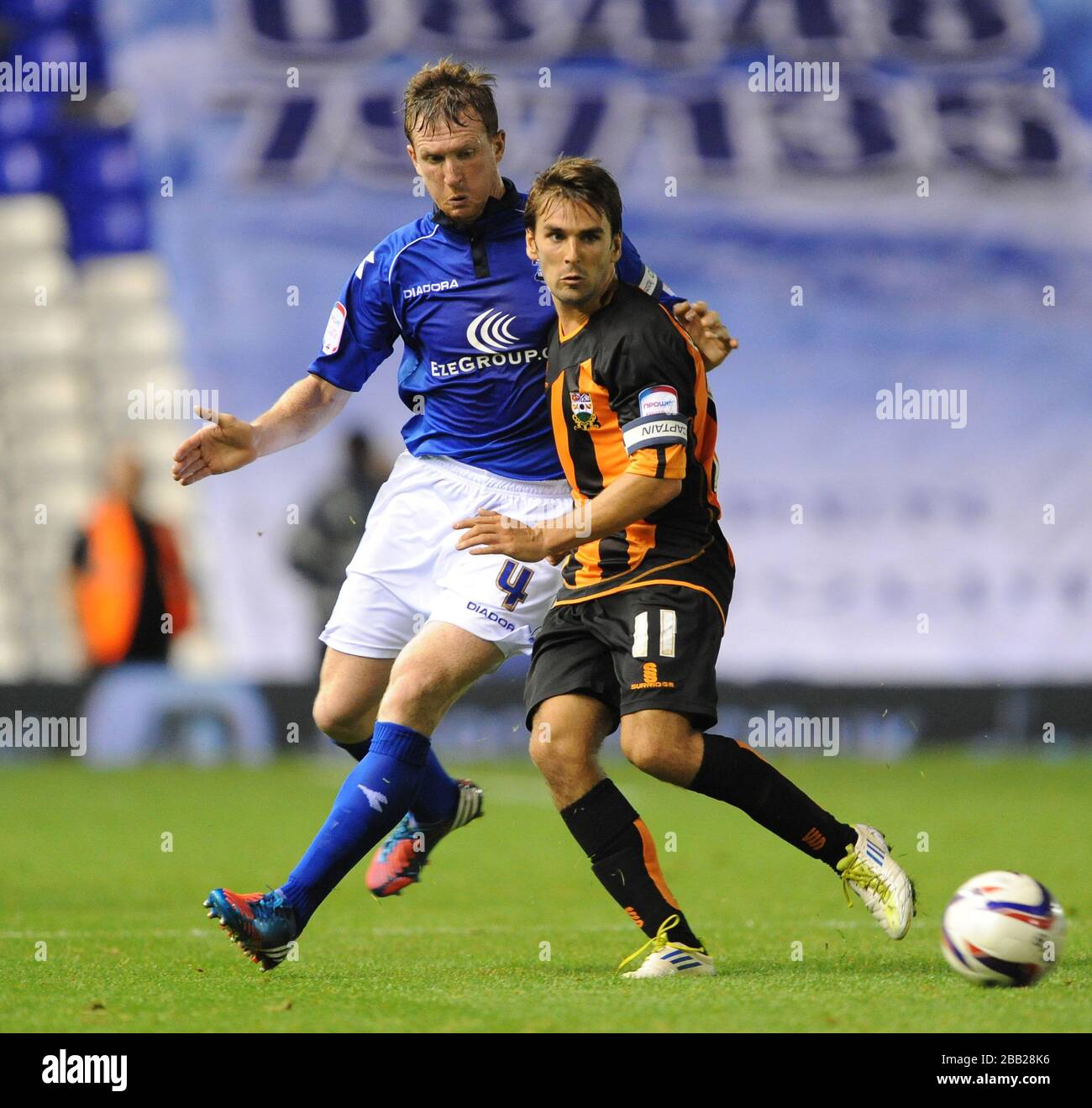 Birmingham City's Steven Caldwell (left) and Barnet's Ricky Holmes ...