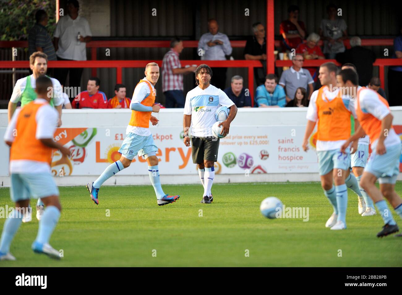 Coventry City coach Richard Shaw (centre) oversees the warm-up Stock ...