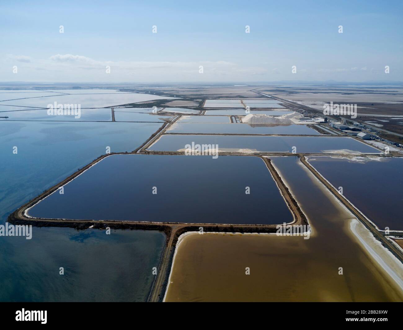 Salt harvesting using solar evaporation ponds at Port Alma Queensland ...