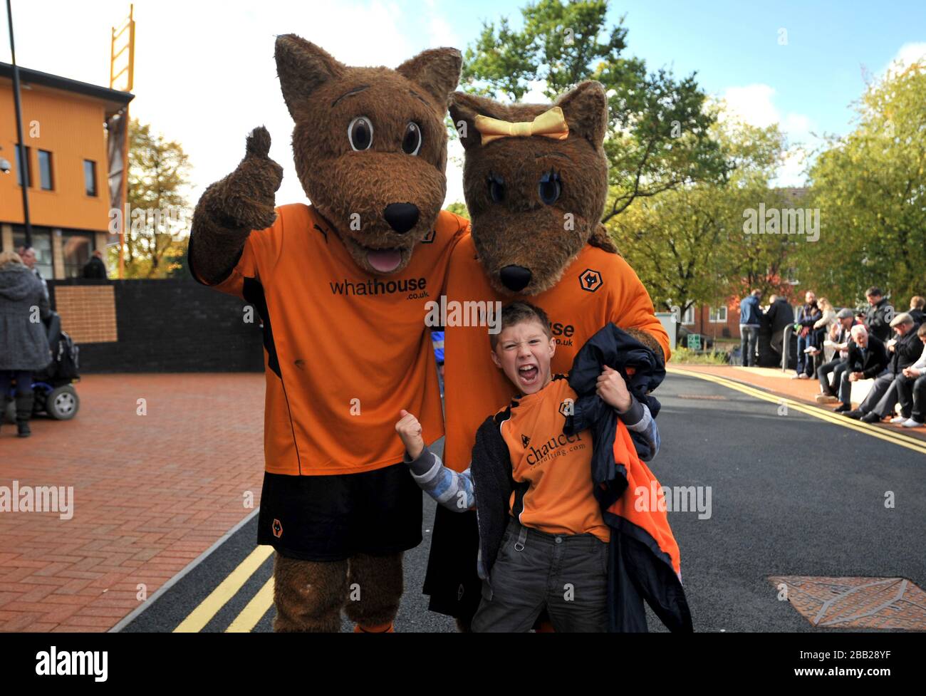 A young Wolverhampton Wanderers fan shows his support as he poses for a ...