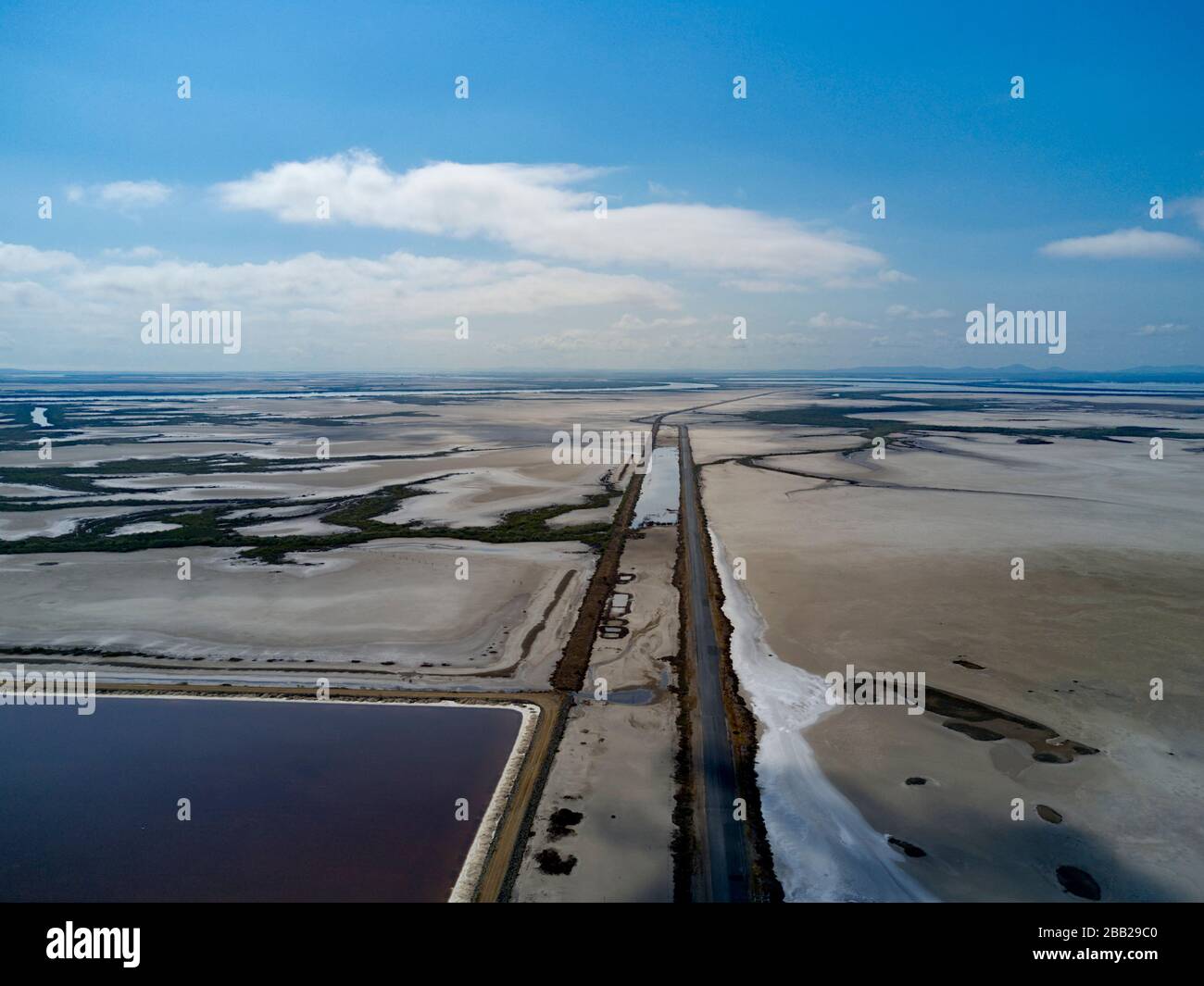 Salt harvesting using solar evaporation ponds at Port Alma Queensland ...