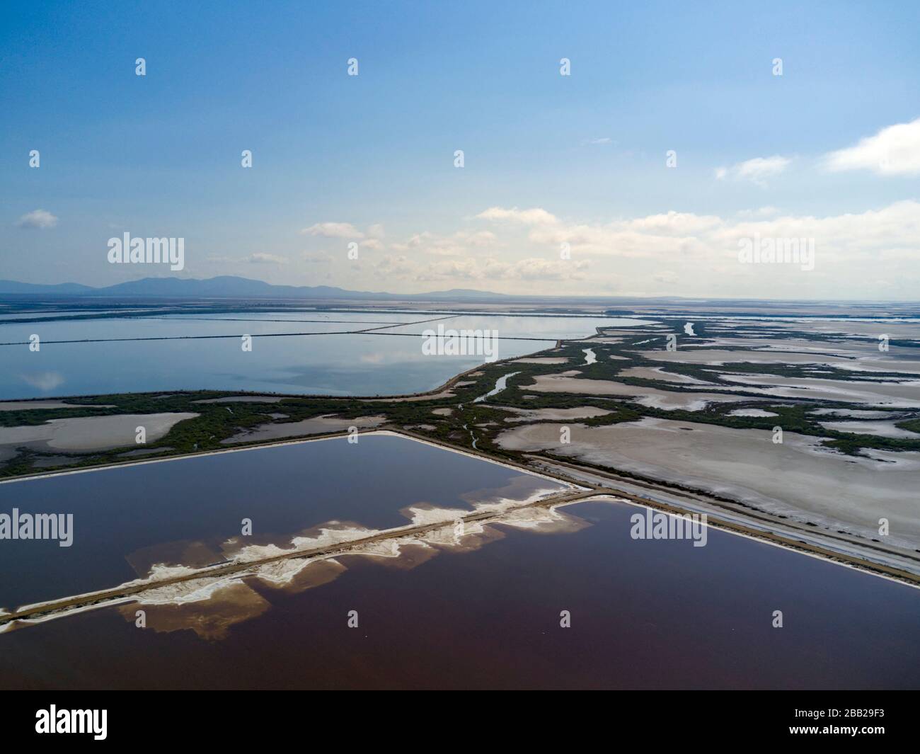 Salt harvesting using solar evaporation ponds at Port Alma Queensland ...