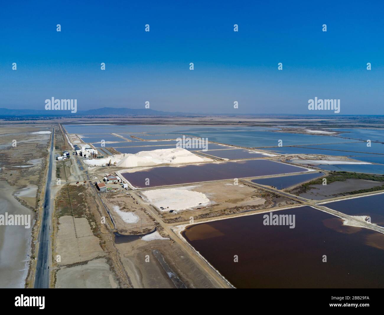 Salt harvesting using solar evaporation ponds at Port Alma Queensland ...