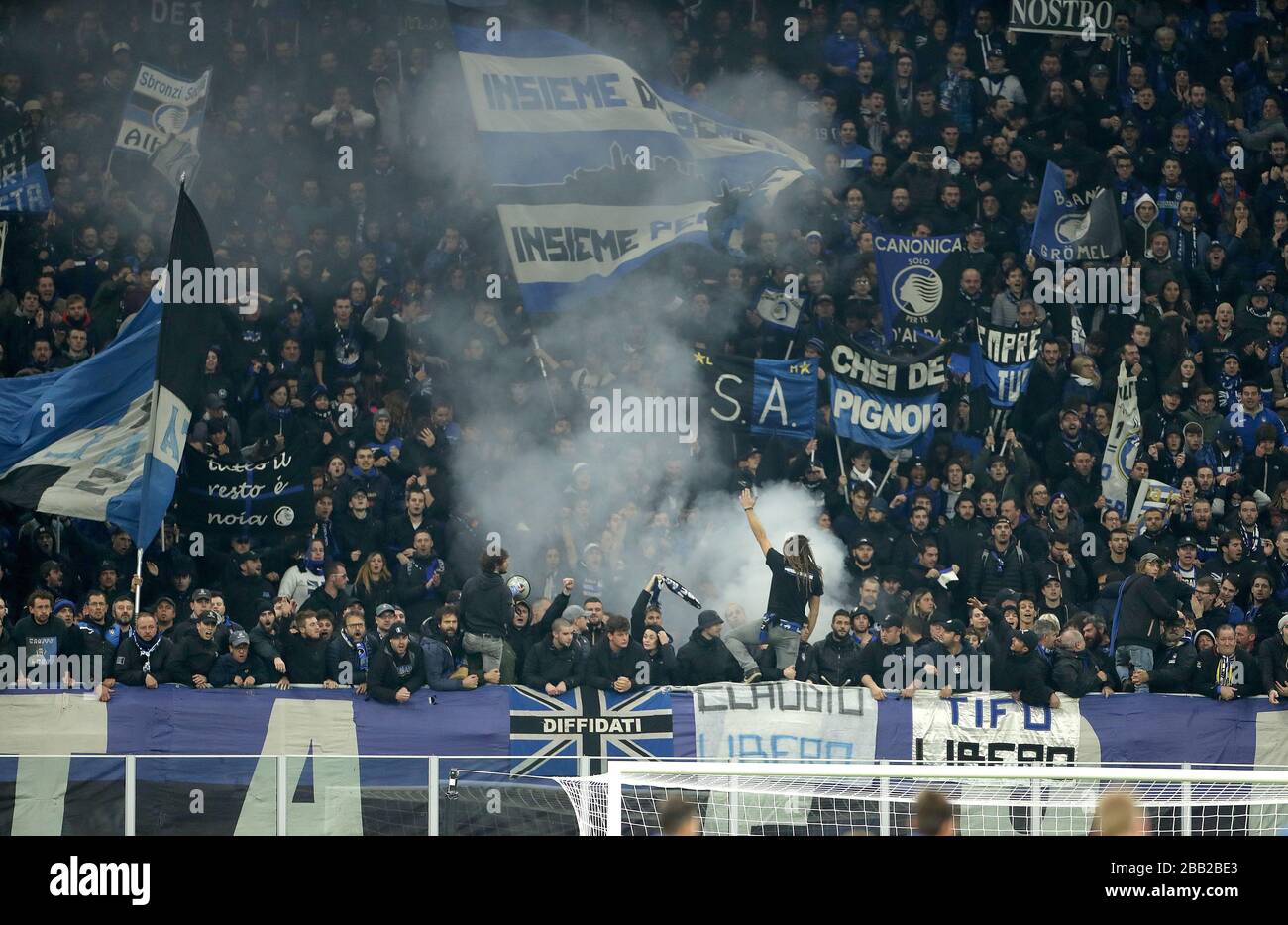 Atalanta fans in the stands show their support Stock Photo - Alamy