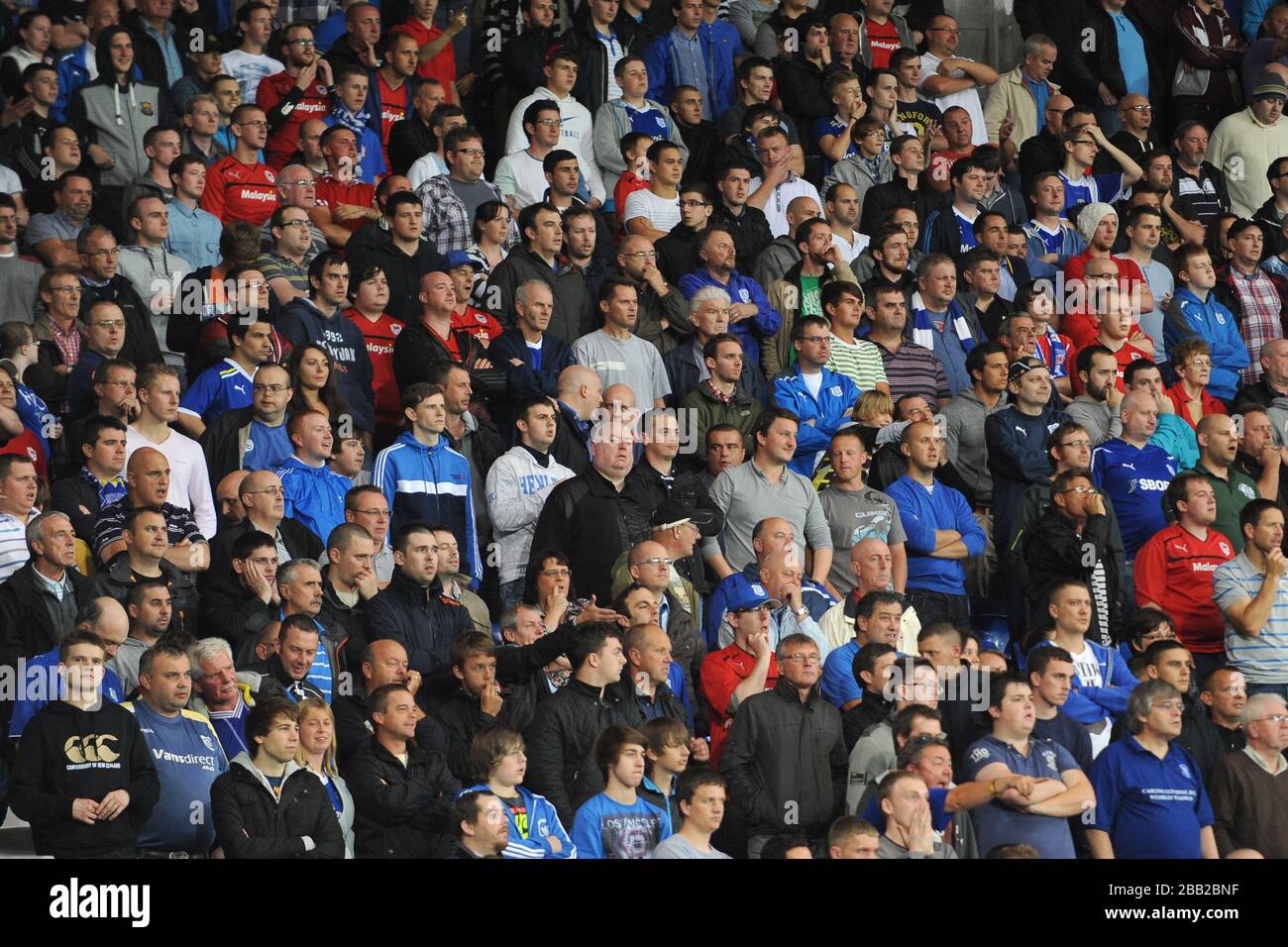 Cardiff City fans in the stands Stock Photo - Alamy
