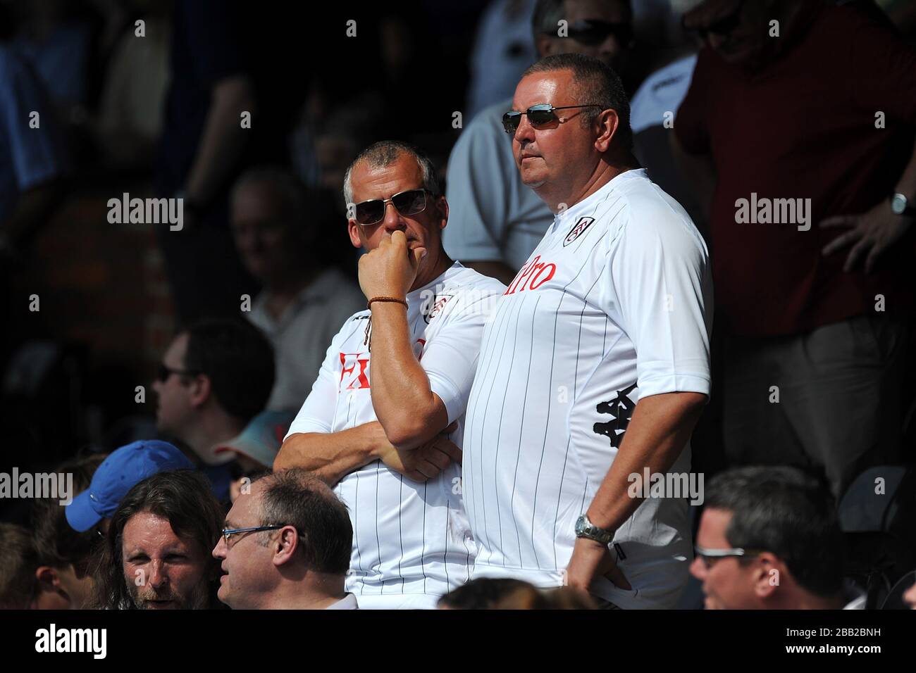 Fulham fans enjoy the atmosphere in the stands Stock Photo - Alamy