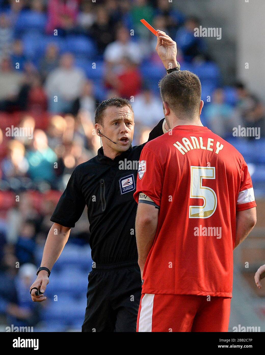 Referee Stuart Attwell shows Blackburn Rovers Grant Hanley the red card ...