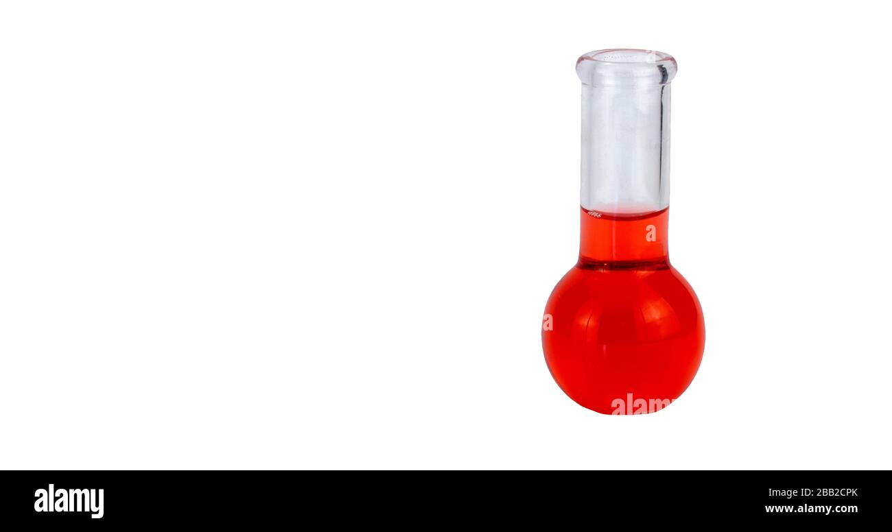 Laboratory glassware with liquid on white background. glass chemical ...