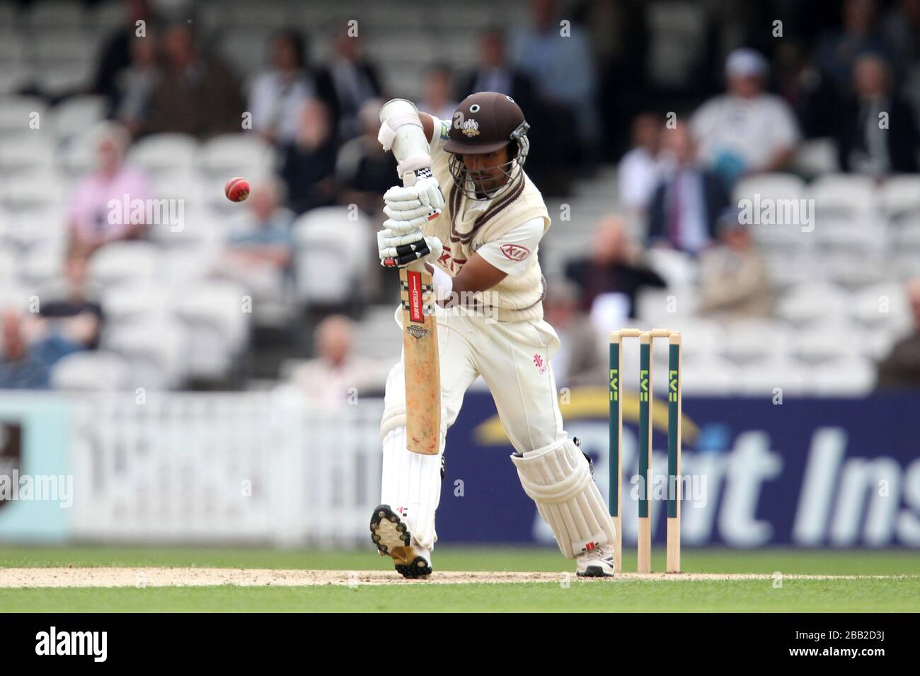 Surrey's Arun Harinath hits out Stock Photo - Alamy