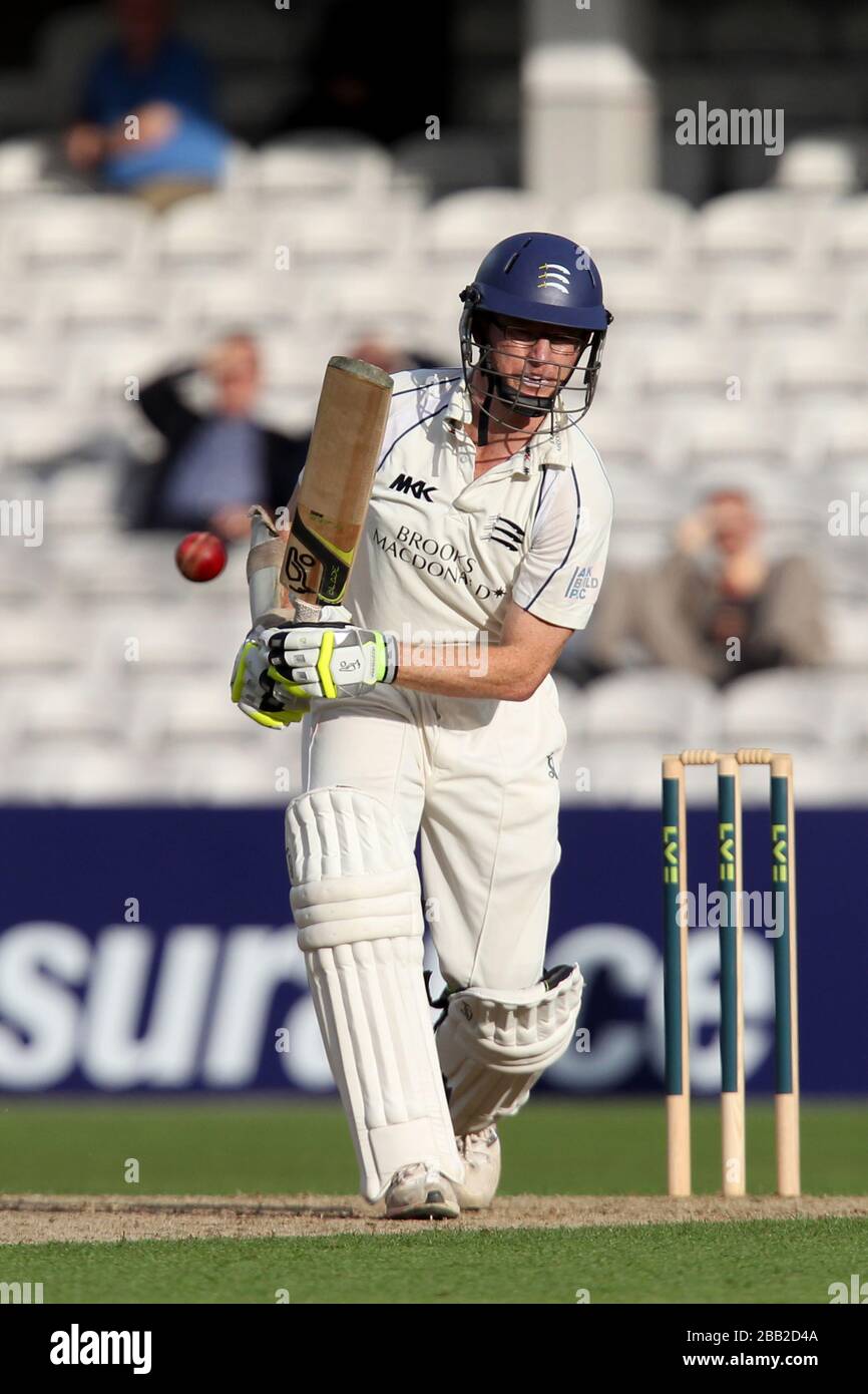 Middlesex's Chris Rogers hits out Stock Photo - Alamy