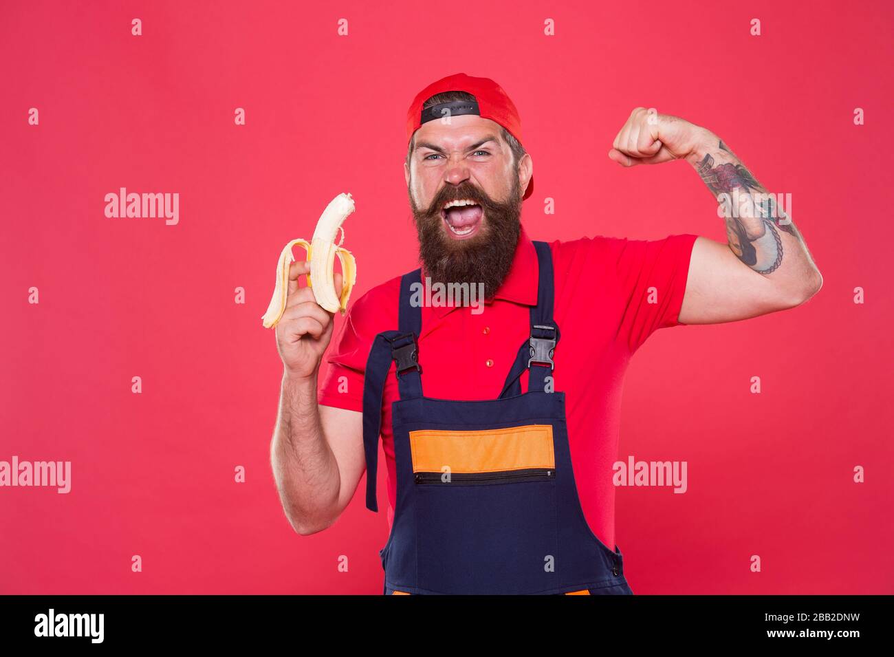 Fresh vitamins. Tasty food. Bite banana. Hungry hipster. Favorite snack ...