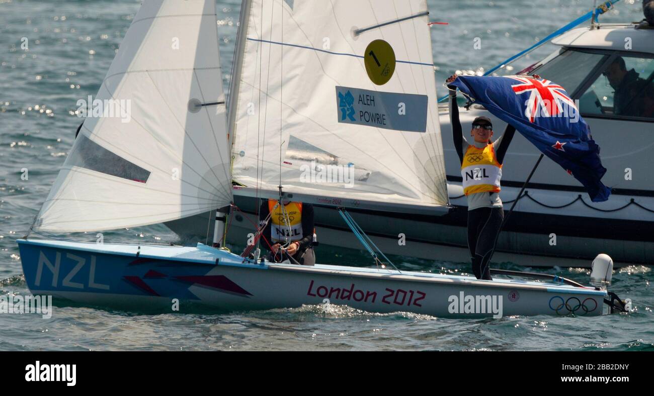 New Zealand's Jo Aleh and Olivia Powrie celebrate winning gold in the ...
