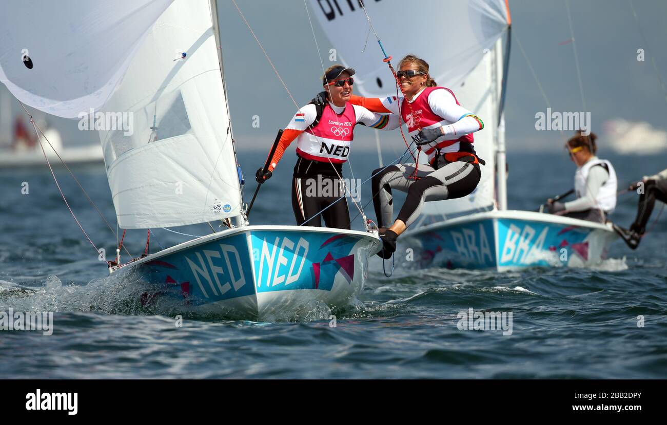 Netherlands' Lisa Westerhof and Lobke Berkhout celebrate their bronze ...
