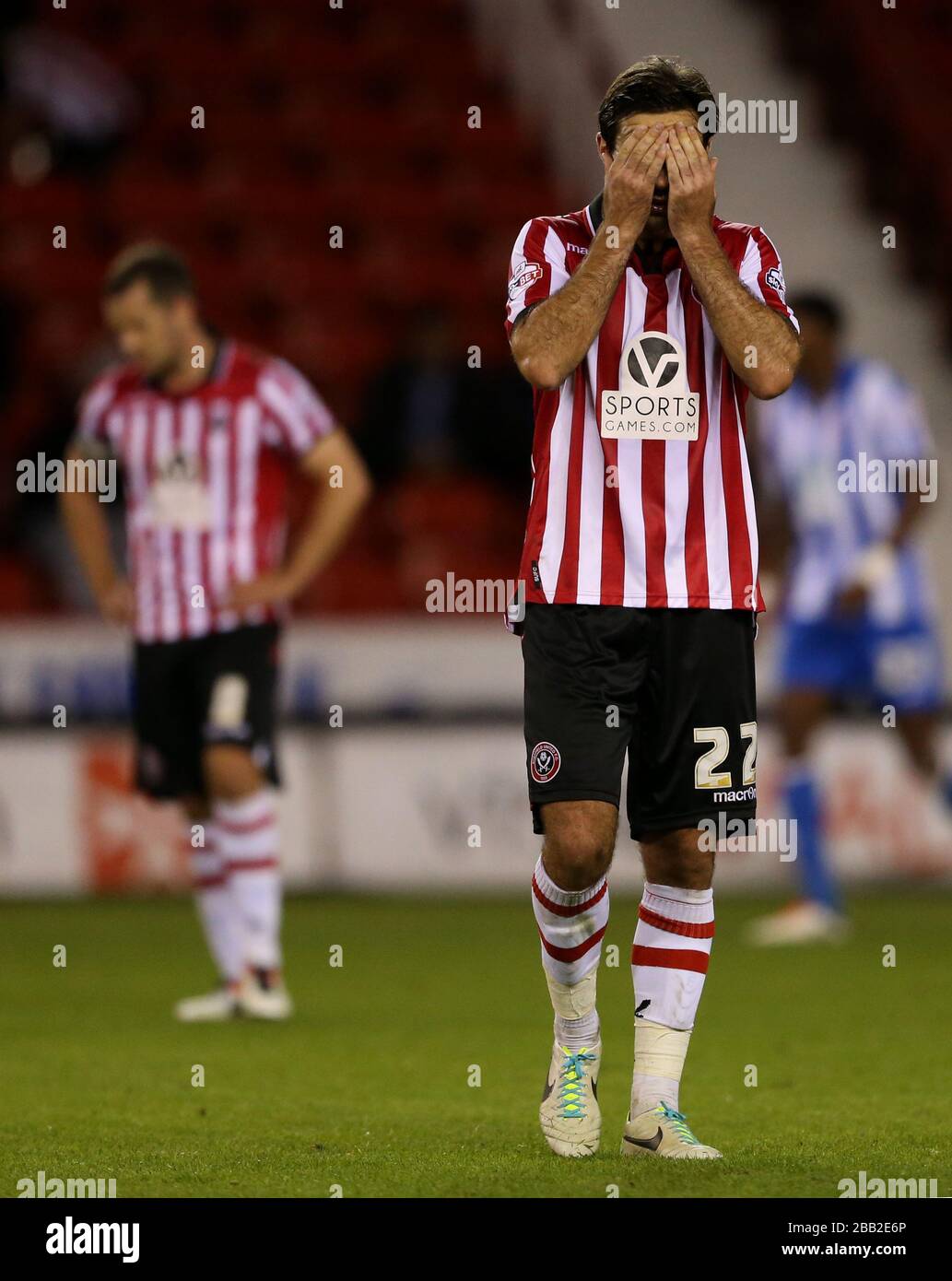 Sheffield United's Simon Lappin holds his head at the final whistle ...