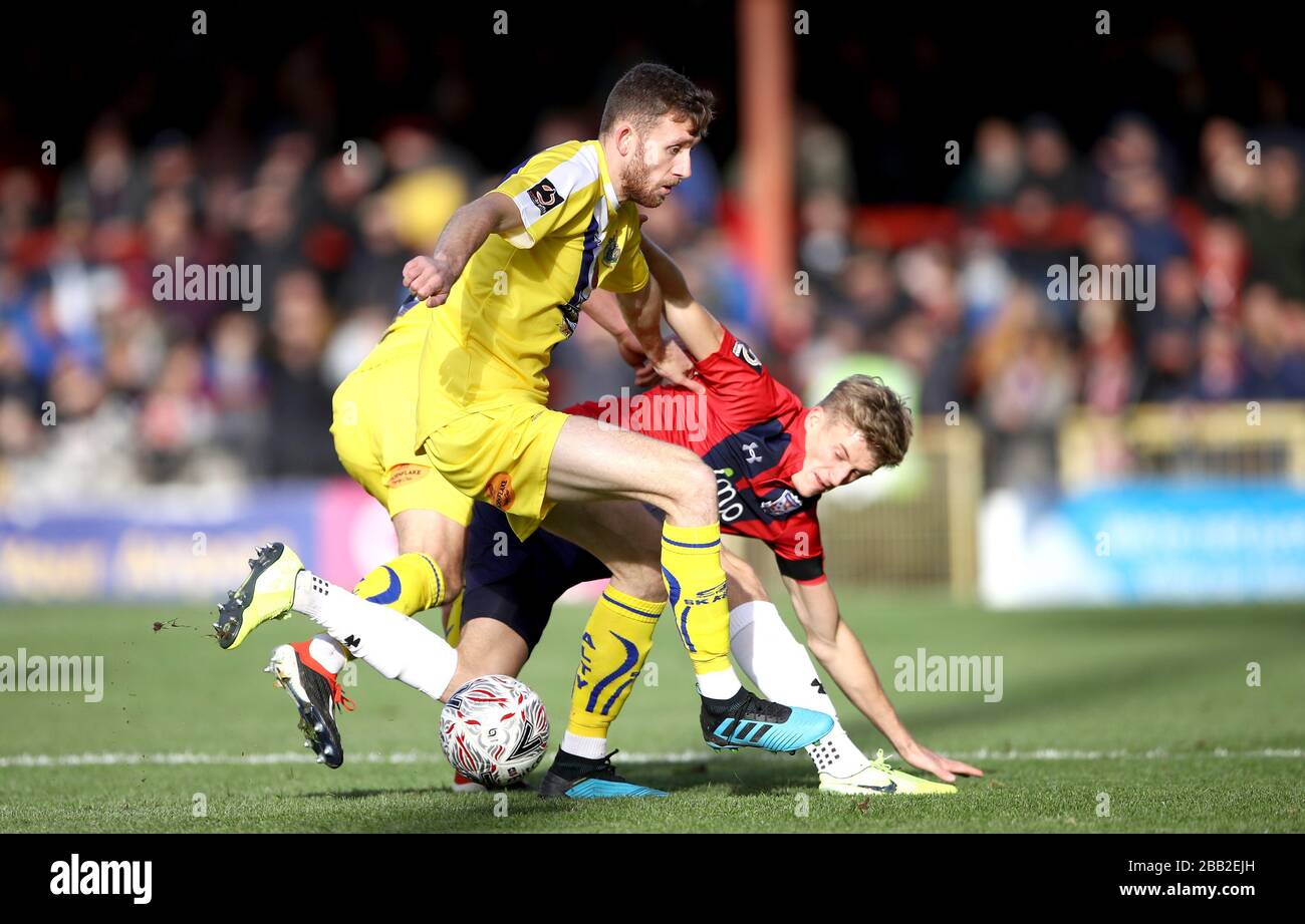Altrincham's James Jones (left) and York City's Alex Kempster battle ...