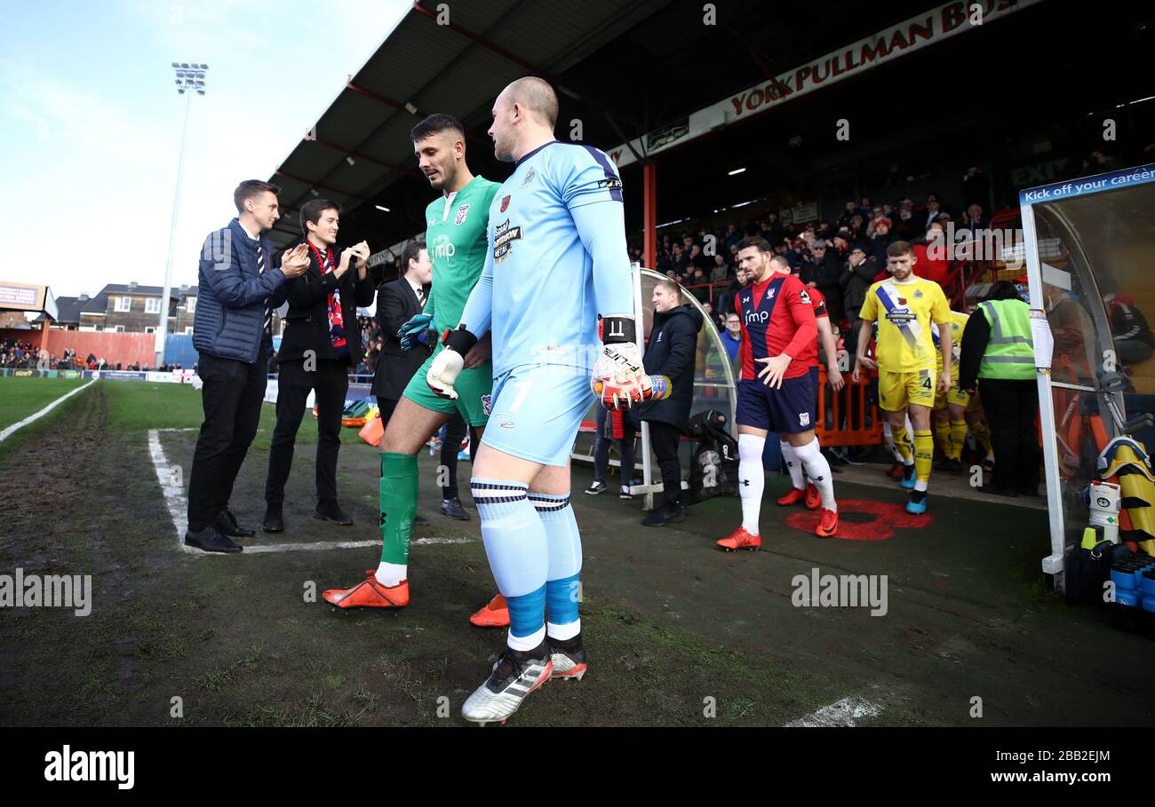 York City goalkeeper Peter Jameson and Altrincham goalkeeper Tony ...