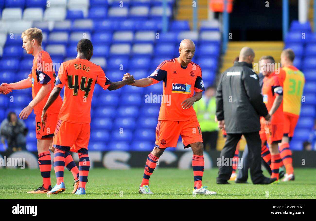 Bolton Wanderers' Alex Baptiste and Medo Kamara shake hands after the ...