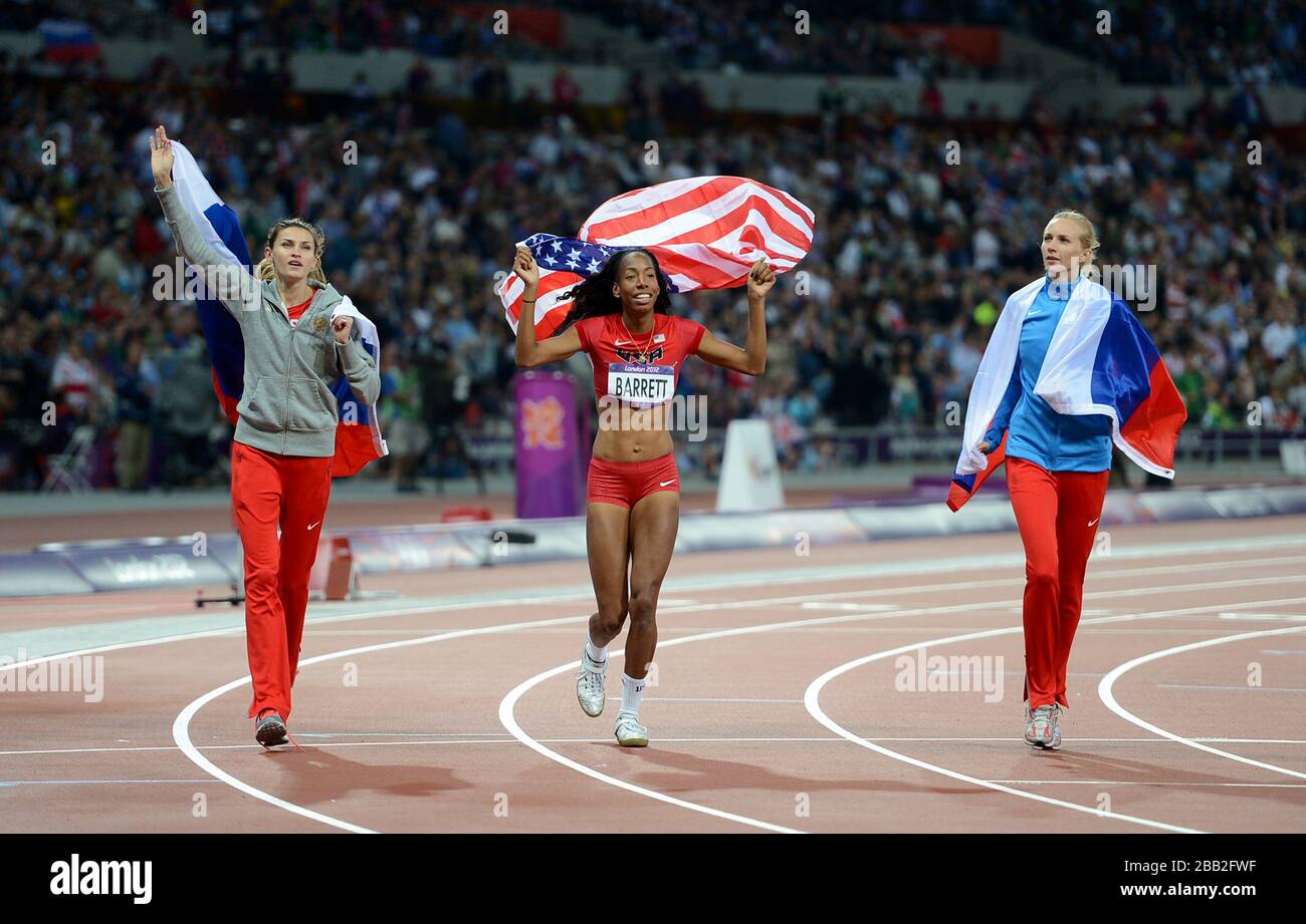 Russia's Anna Chicherova celebrtates winning with second placed USA's ...