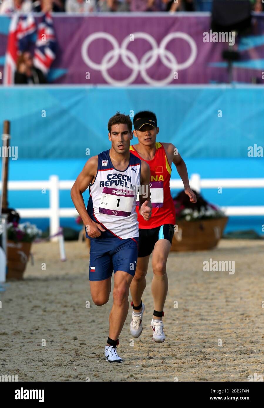 Czech Republic's David Svobada (left) beats China's Zhongrong Cao in ...
